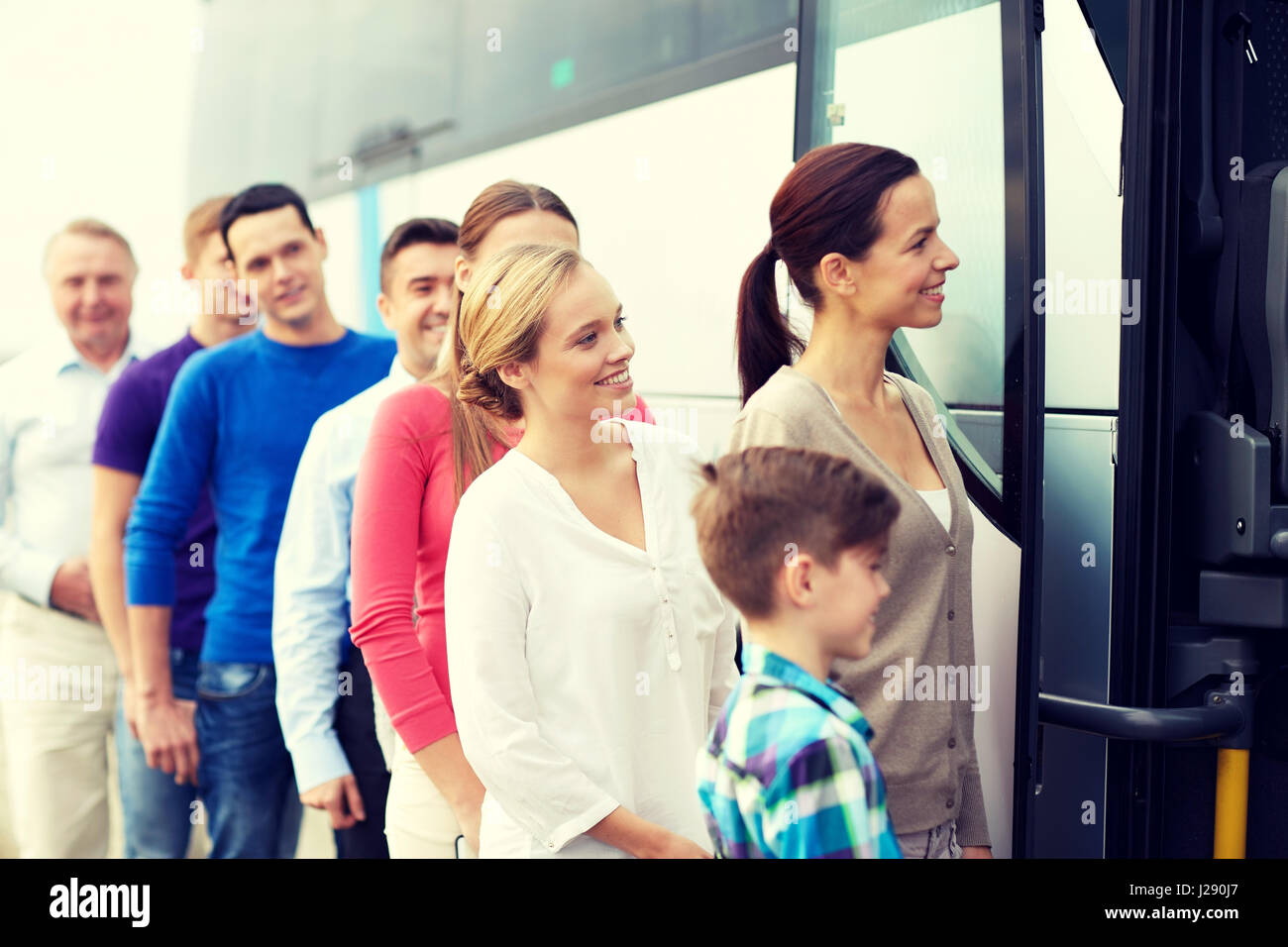 group of happy passengers boarding travel bus Stock Photo - Alamy