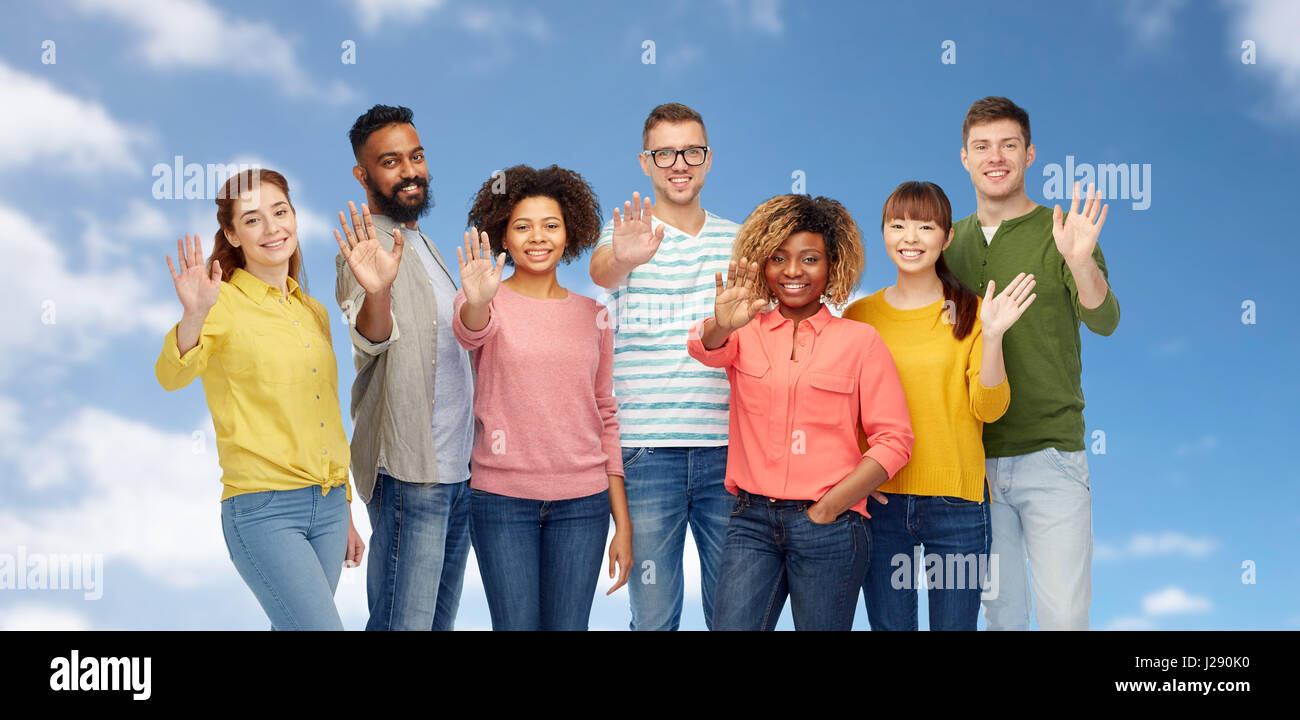Woman waving to group hi-res stock photography and images - Alamy