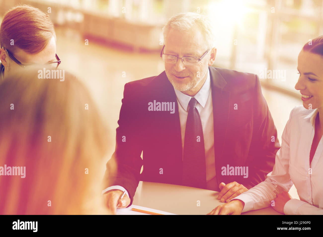 smiling business people meeting in office Stock Photo - Alamy