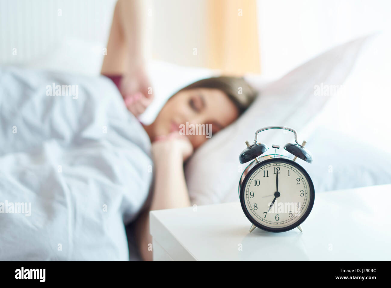 Seven oclock so time to get up Stock Photo - Alamy