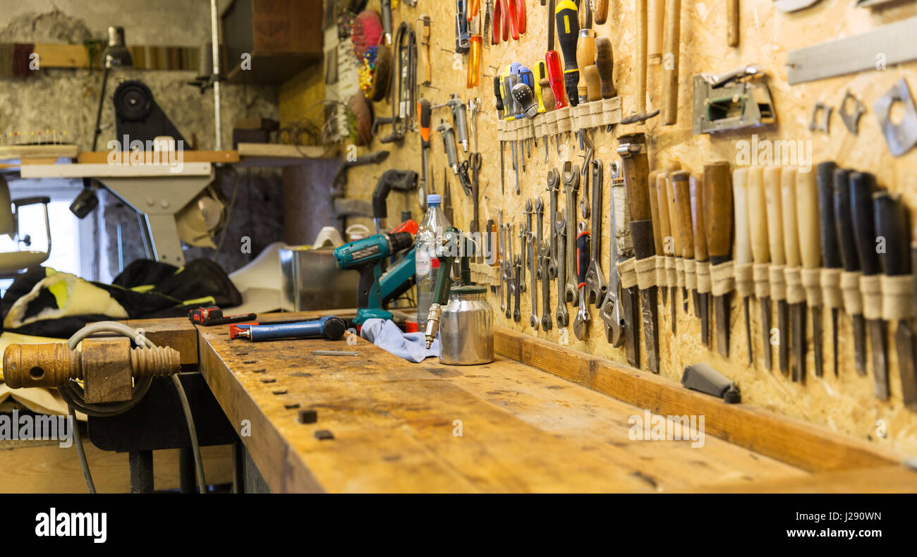 work tools and workbench at workshop Stock Photo - Alamy