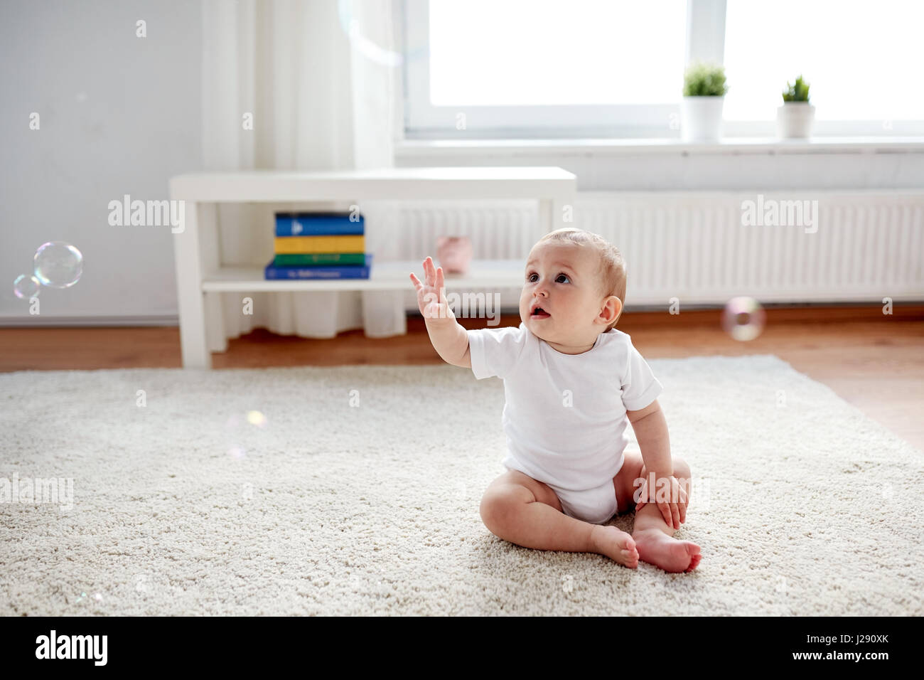 Baby and bubbles hi-res stock photography and images - Alamy