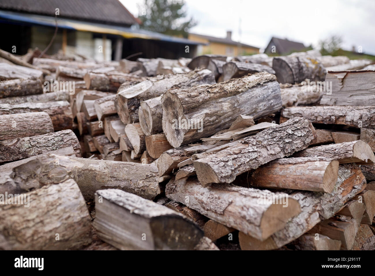stack of firewood on farm at country Stock Photo - Alamy