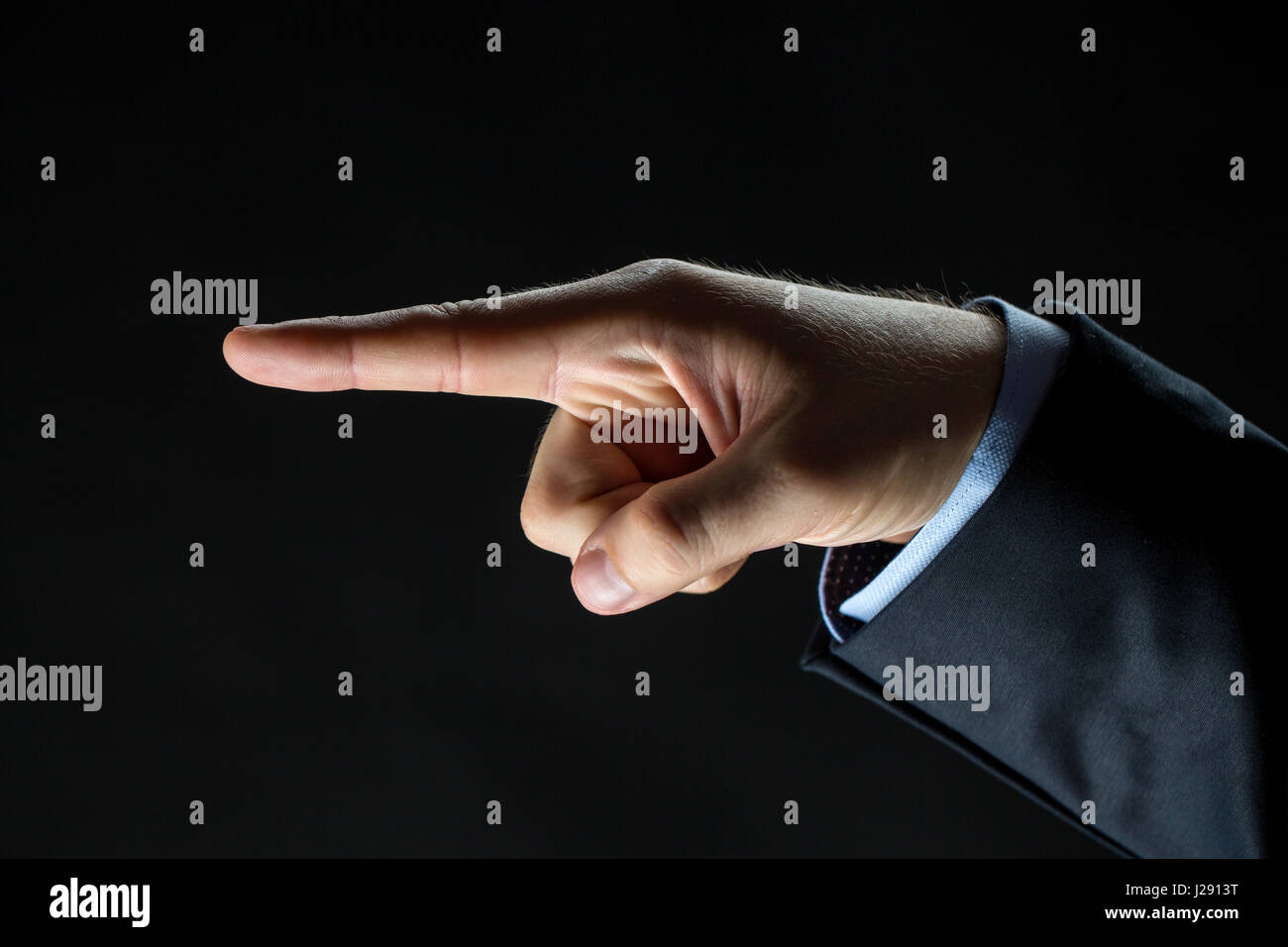 Hand touching the suit hi-res stock photography and images - Alamy