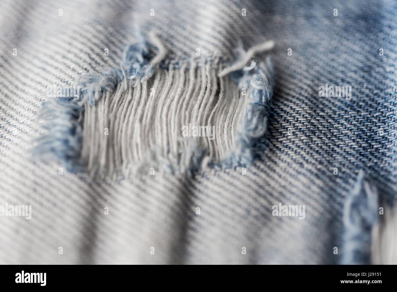 Hole clothes hi-res stock photography and images - Alamy