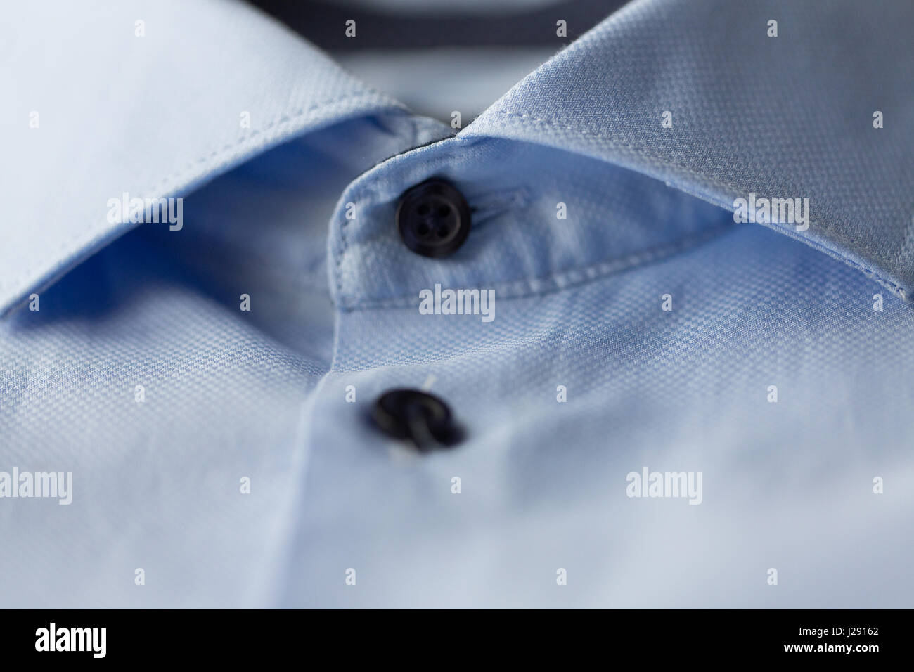 close up of blue shirt collar Stock Photo - Alamy