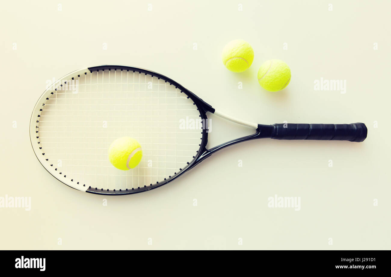 close up of tennis racket with balls Stock Photo - Alamy