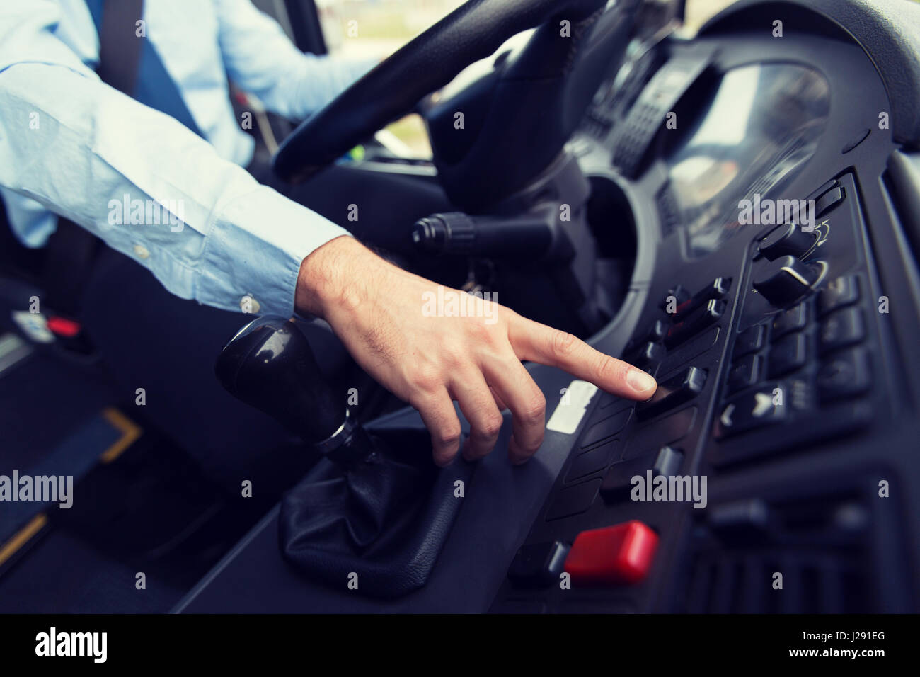 close up of driver driving passenger bus Stock Photo - Alamy