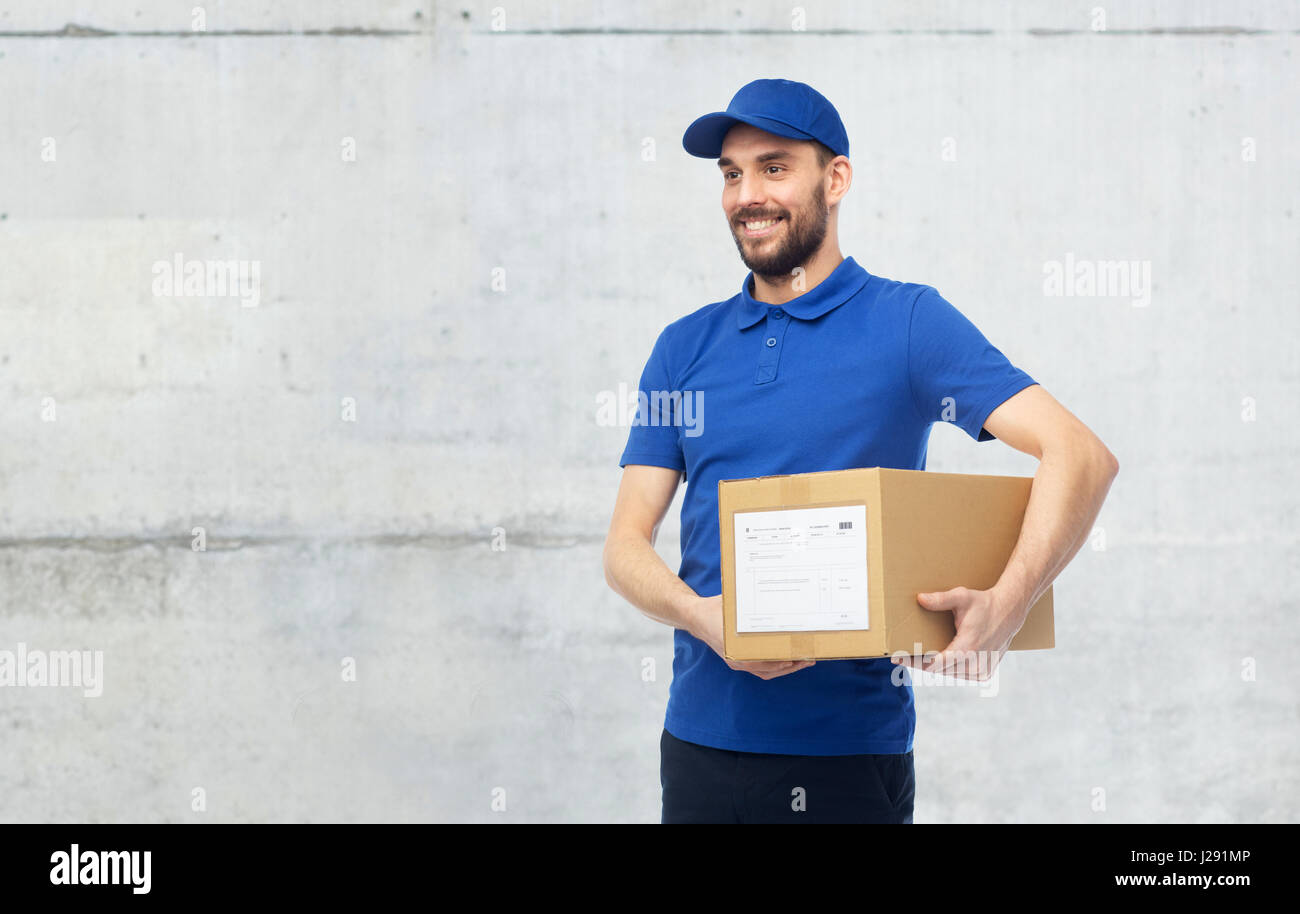 happy delivery man with parcel box Stock Photo - Alamy