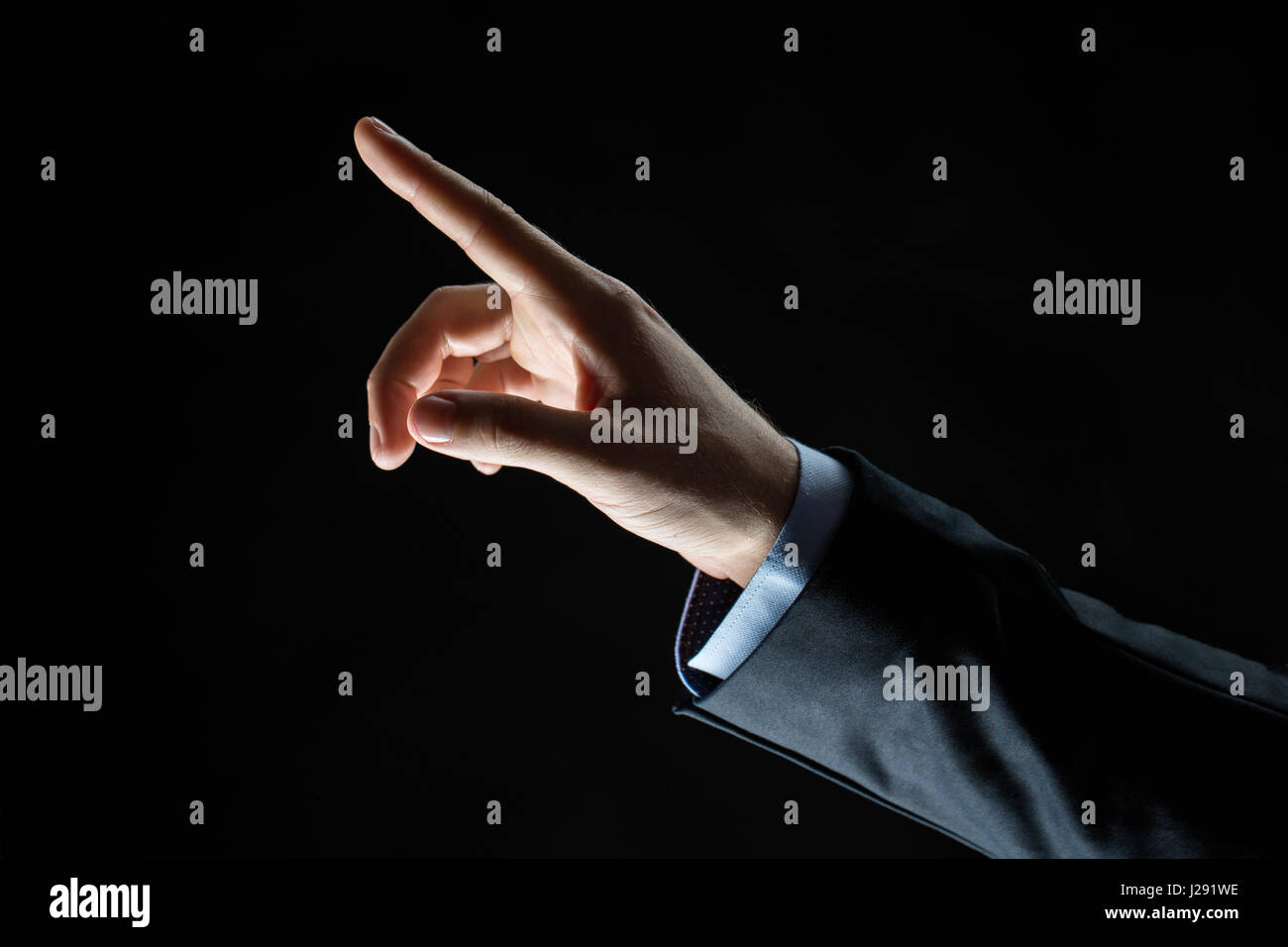 Hand touching the suit hi-res stock photography and images - Alamy
