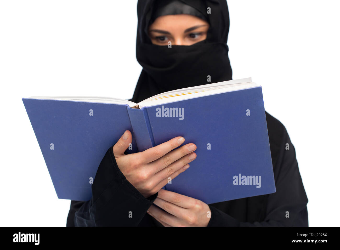 Person reading arabic book hi-res stock photography and images - Alamy