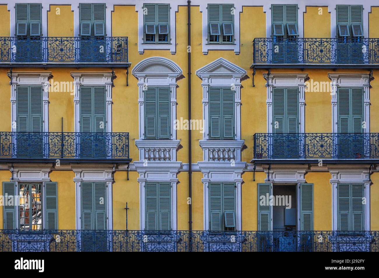 Typical french architecture in Nice, France. Frontal symmetrical facade ...