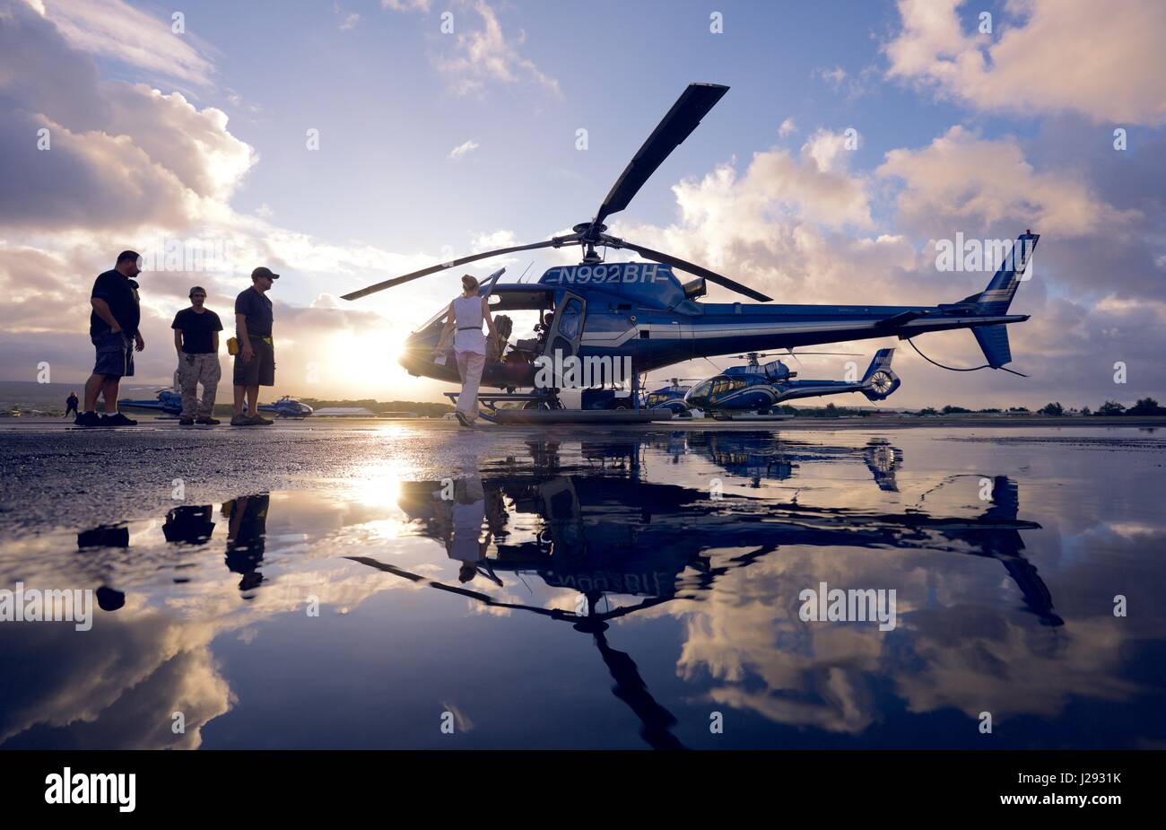 Preparing for flight in a helicopter over an active volcano in Hawaii ...