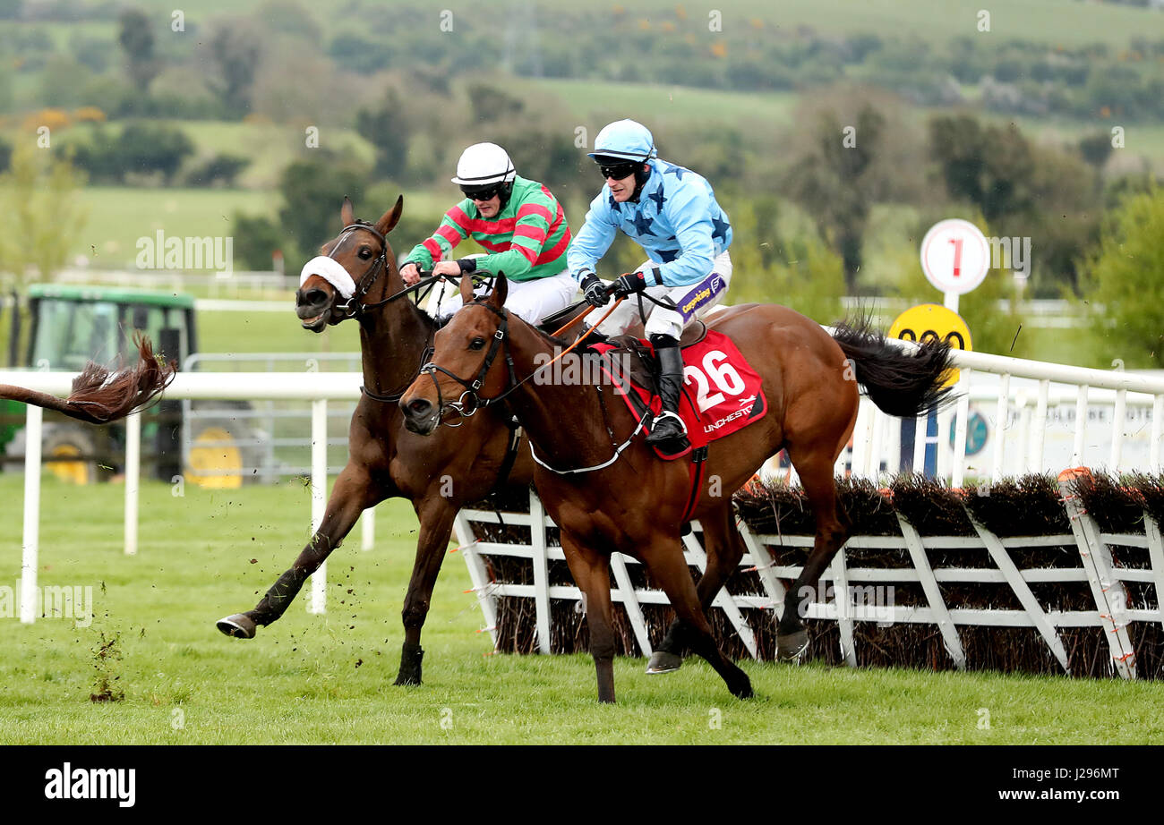 Magic Of Light (left) ridden by jockey Ryan Treacy on the way to ...