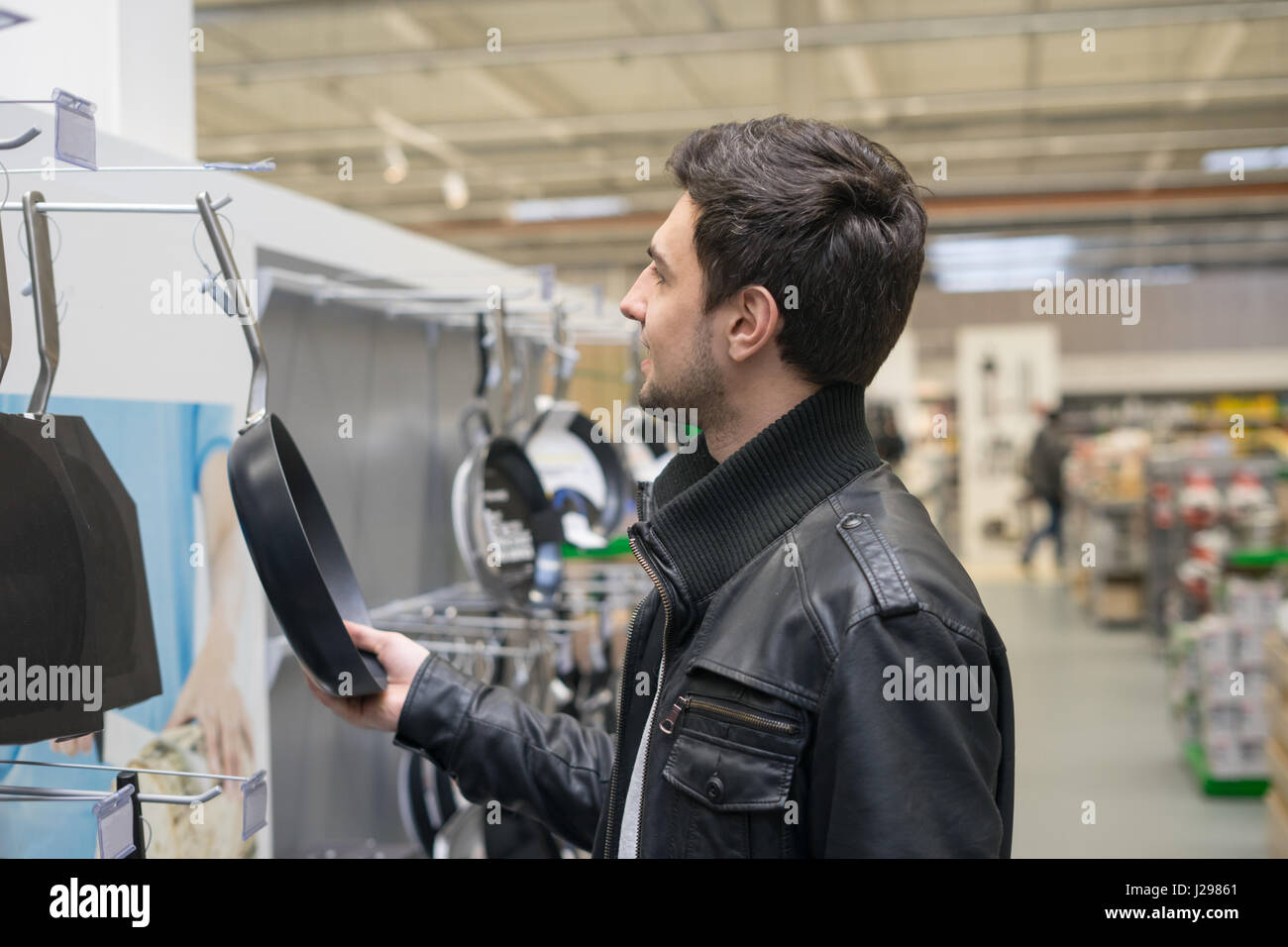 male customer choosing Stock Photo - Alamy