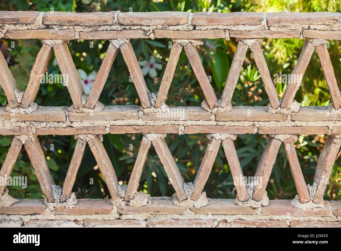 Old balcony railings made of clay blocks, Greek style architecture ...