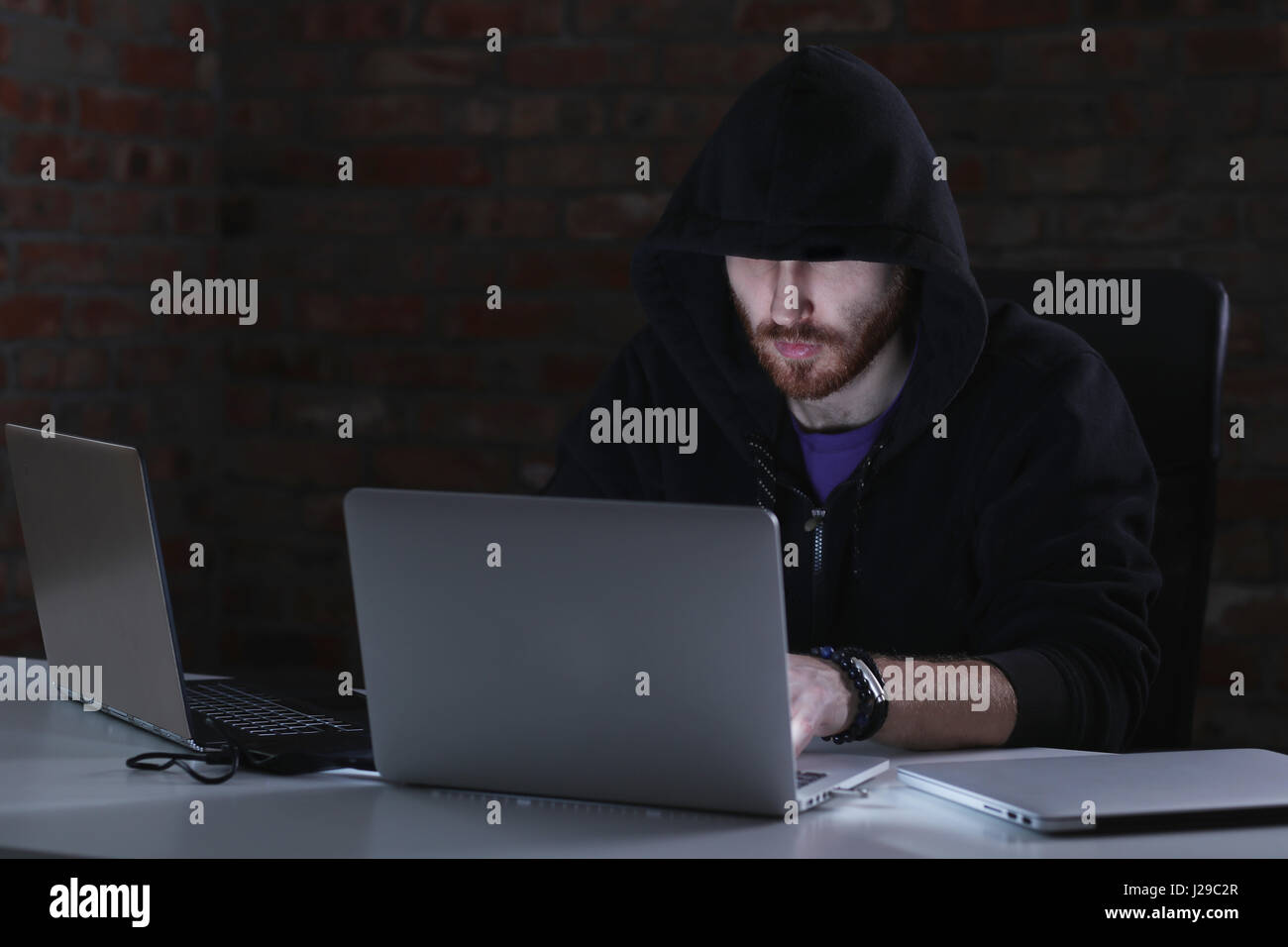 Male computer hacker hi-res stock photography and images - Alamy
