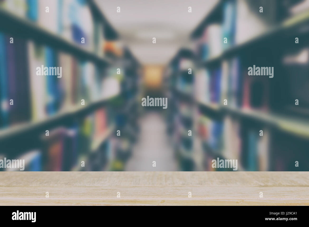 interior of modern library with gray book shelves, blur background with ...