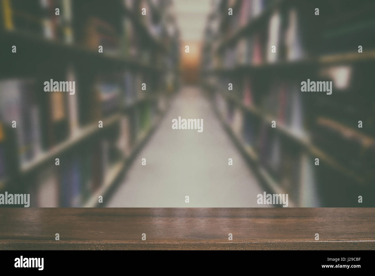 interior of modern library with gray book shelves, blur background with ...