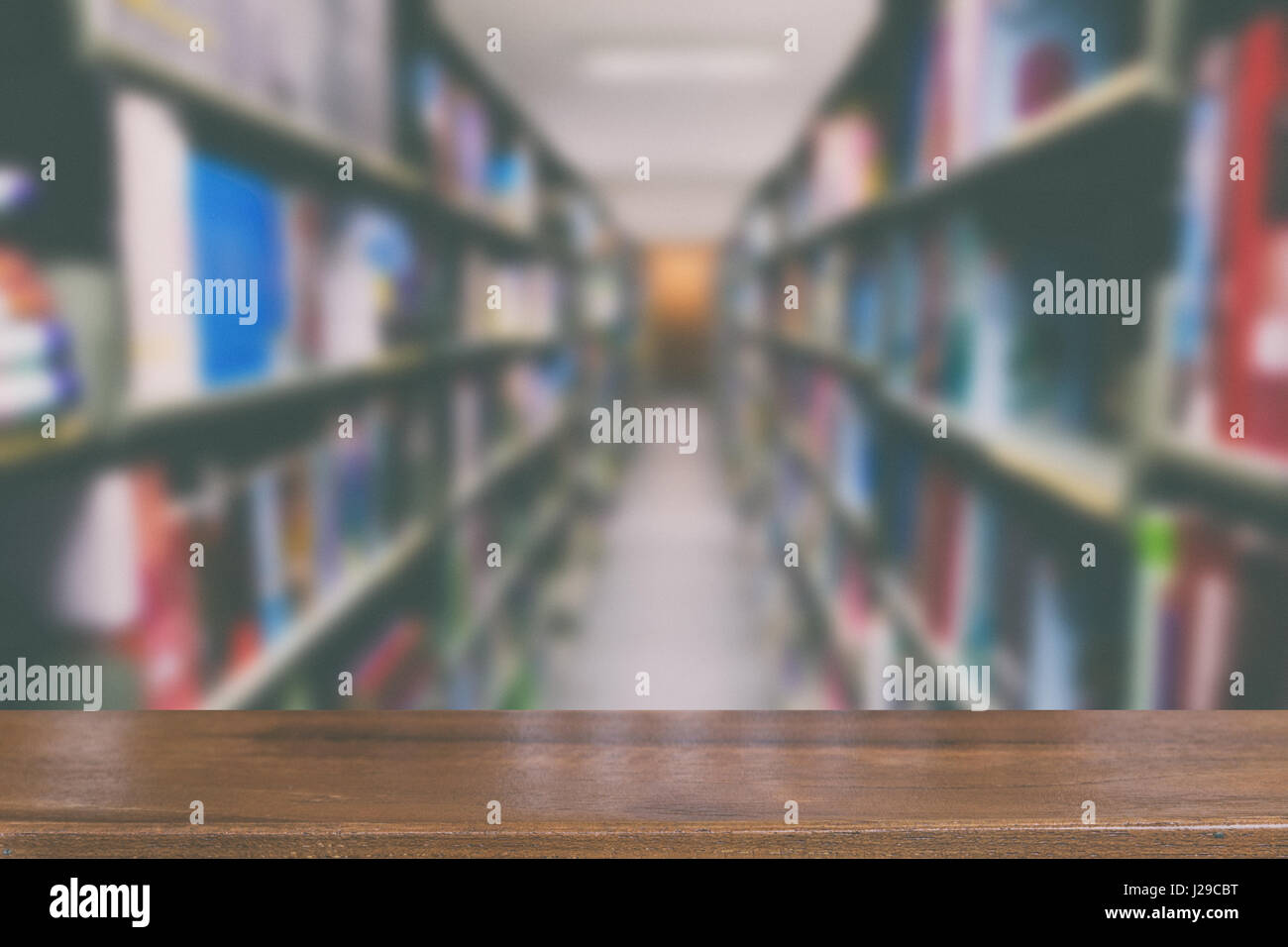 interior of modern library with gray book shelves, blur background with ...