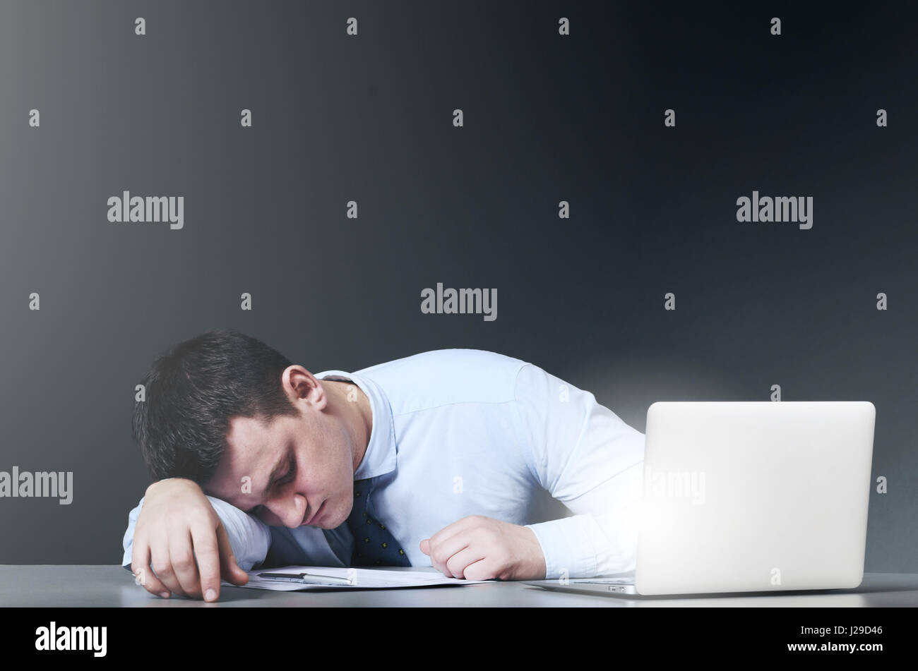 Exhausted businessman sleeps Stock Photo - Alamy