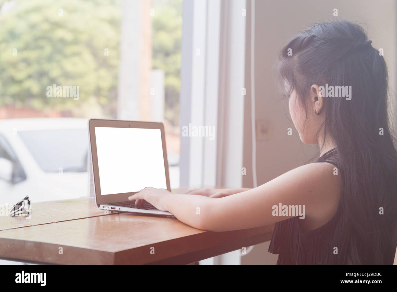 Beautiful asian student girl learning, studying online using laptop ...