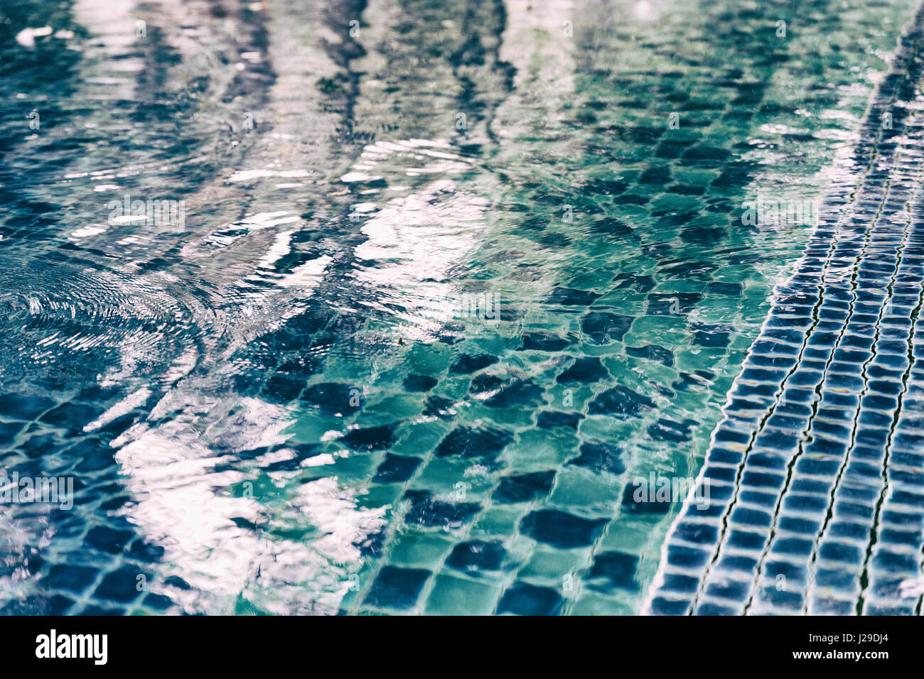 Blue ceramic tile in swimming pool - texture background Stock Photo - Alamy