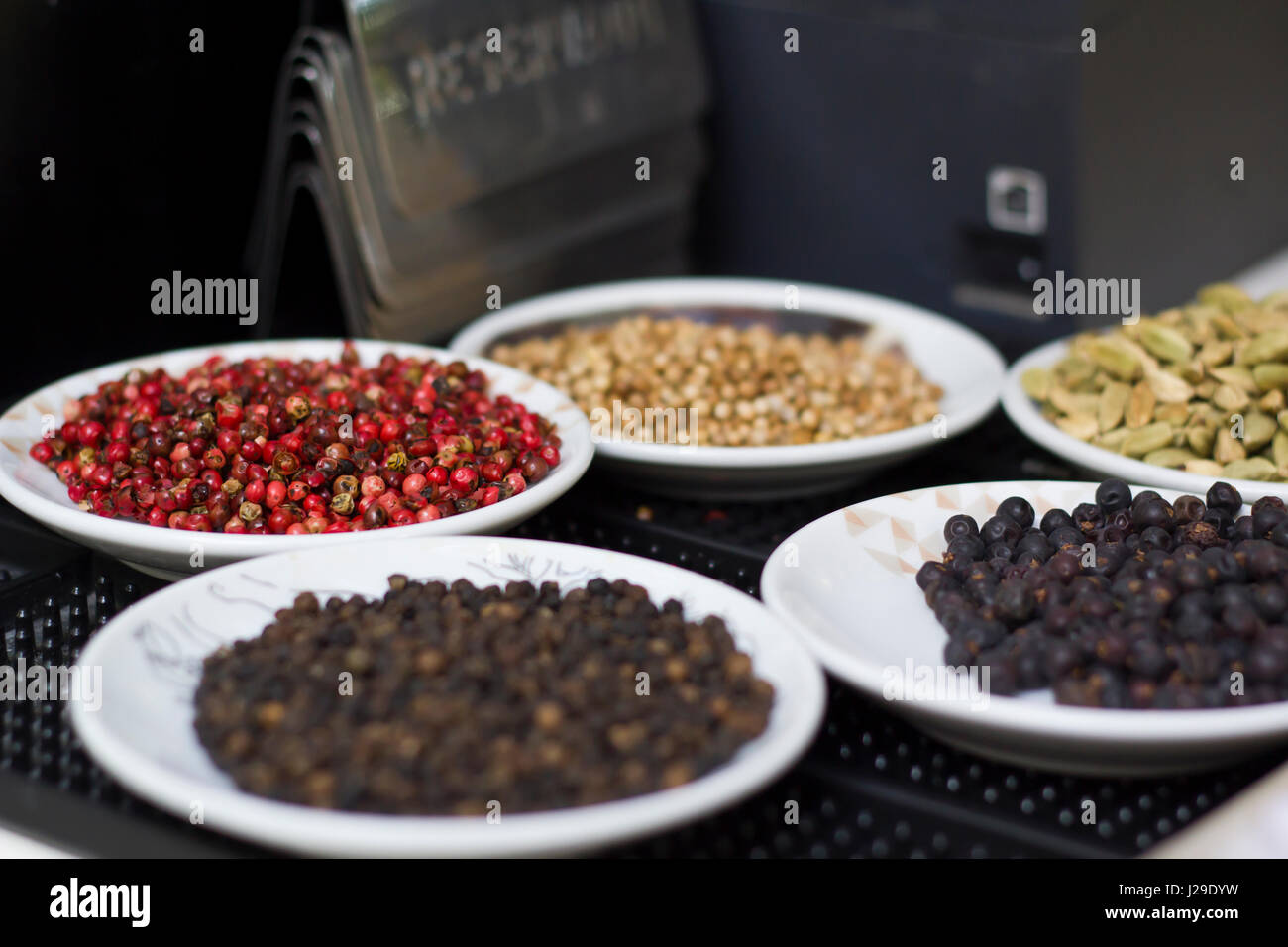 Red pepper seeds, black pepper seeds, cardamom seeds and other spices ...