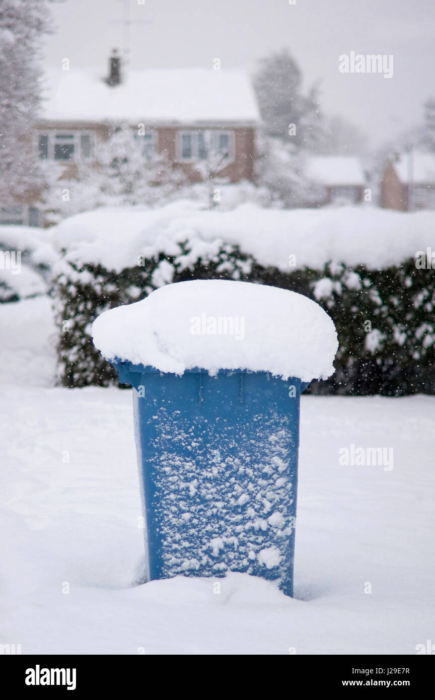 refuse collection 'wheelie' dustbin in deep snow Stock Photo - Alamy