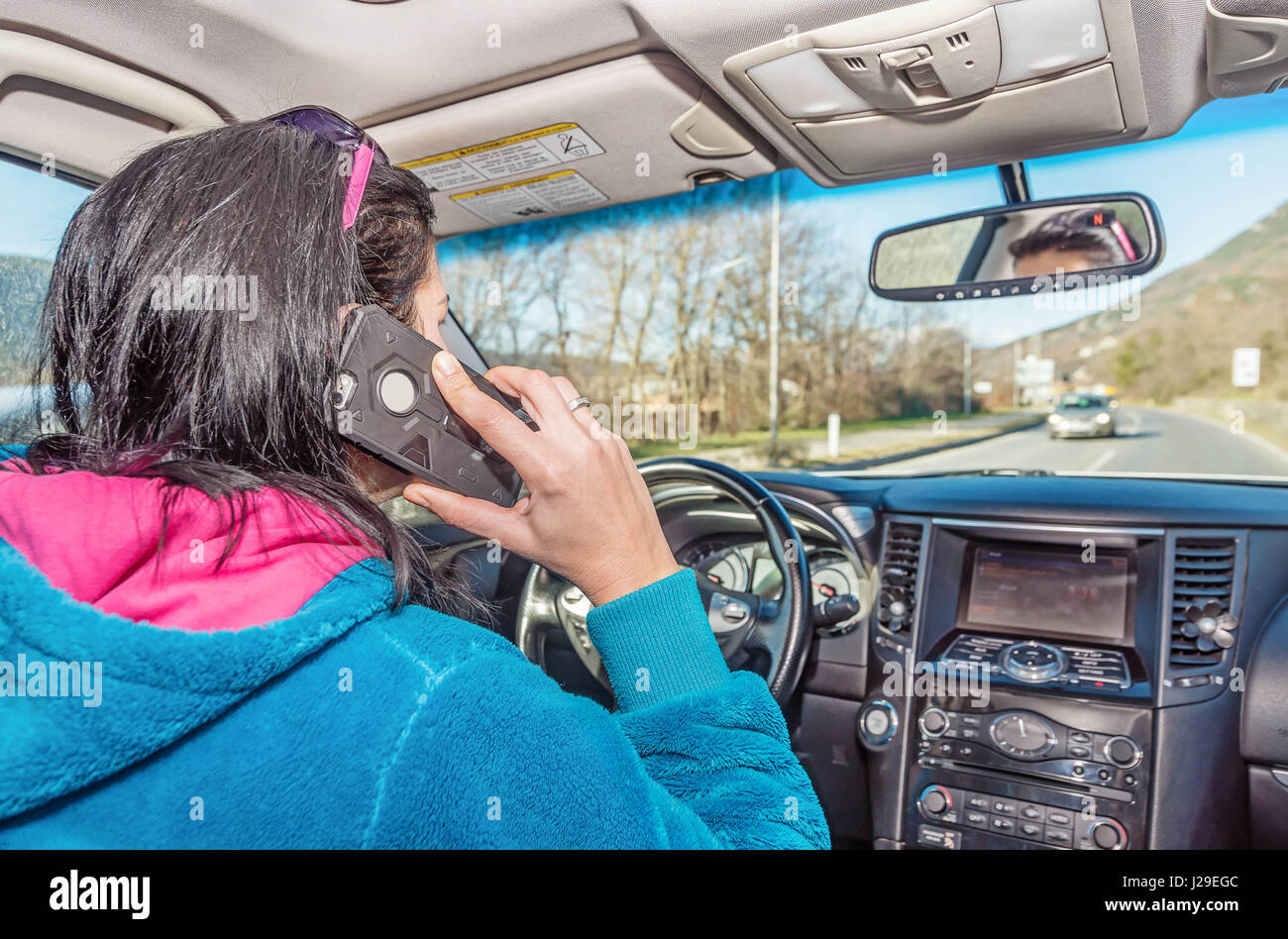Woman whilst driving hi-res stock photography and images - Alamy