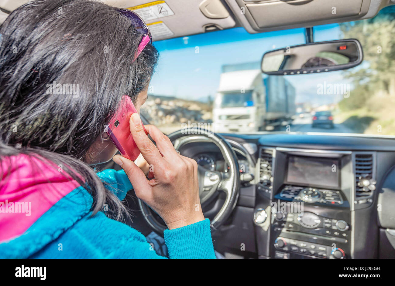 Woman whilst driving hi-res stock photography and images - Alamy