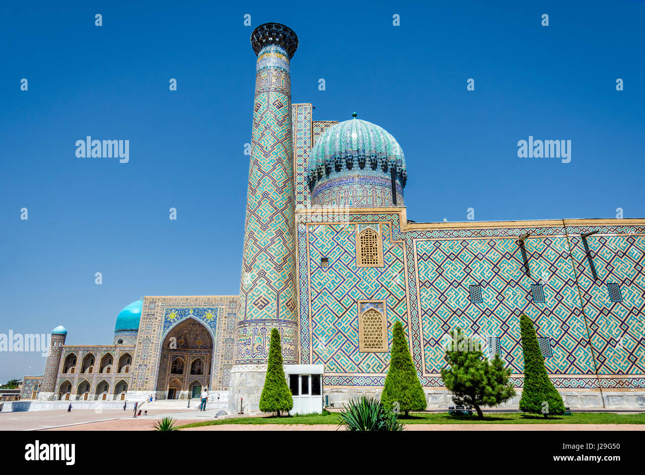 SAMARKAND, UZBEKISTAN - AUGUST 28: People walking in front of Registan ...