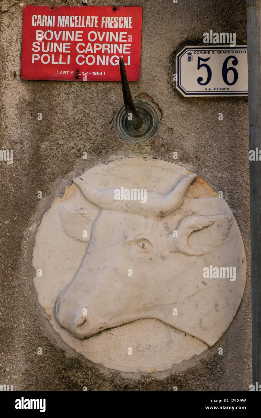 GUARDISTALLO, Pisa, Italy - Marble bas-relief of a cow's head symbol of ...