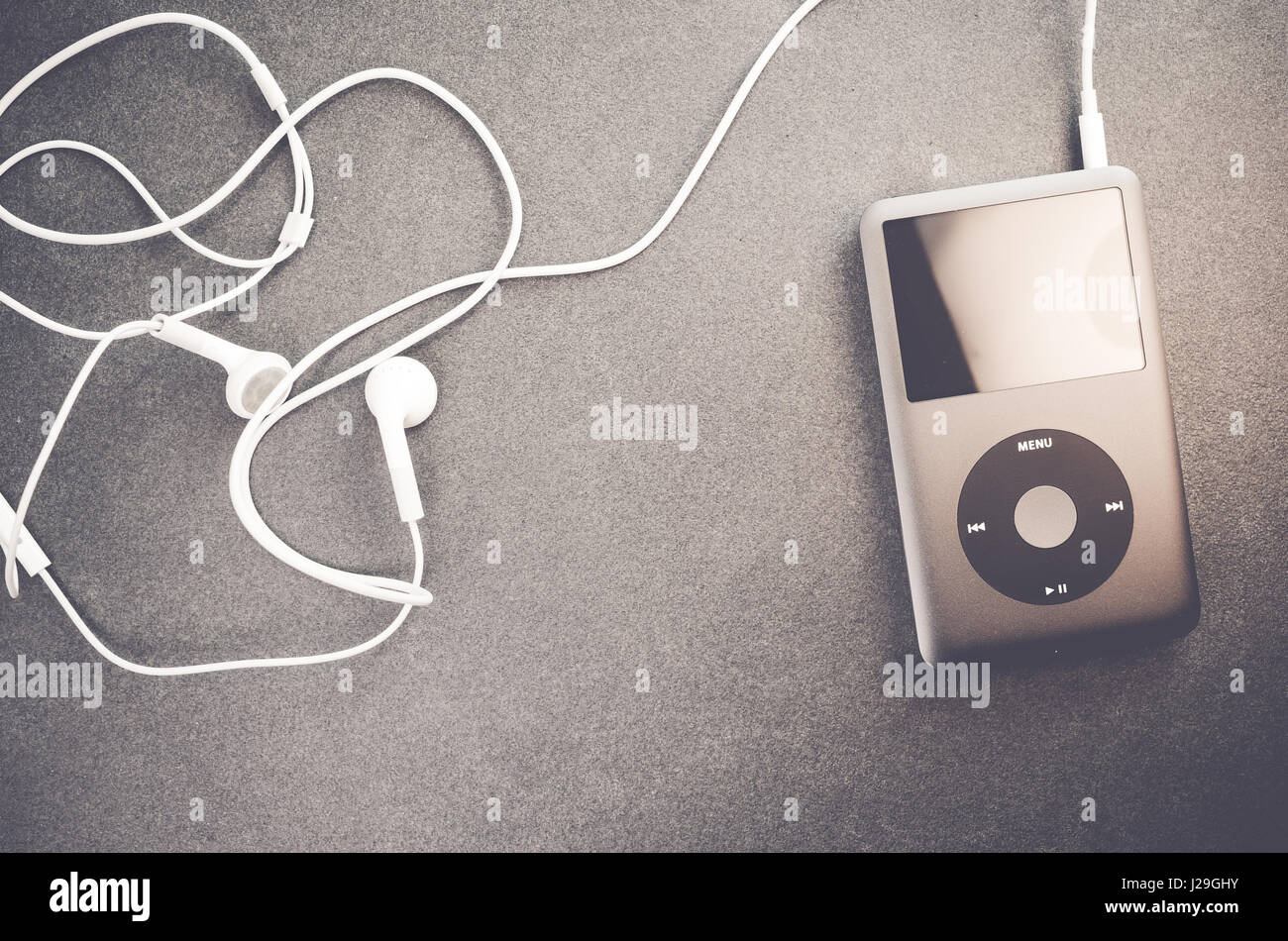 Apple ipod classic music player on a stone surface - top view Stock ...
