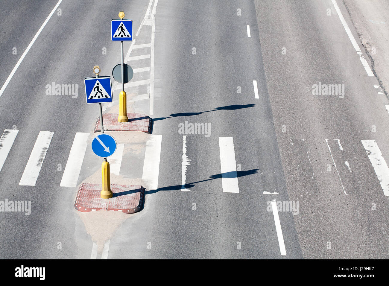 Zebra pattern pedestrian crossing with some road signs Stock Photo - Alamy
