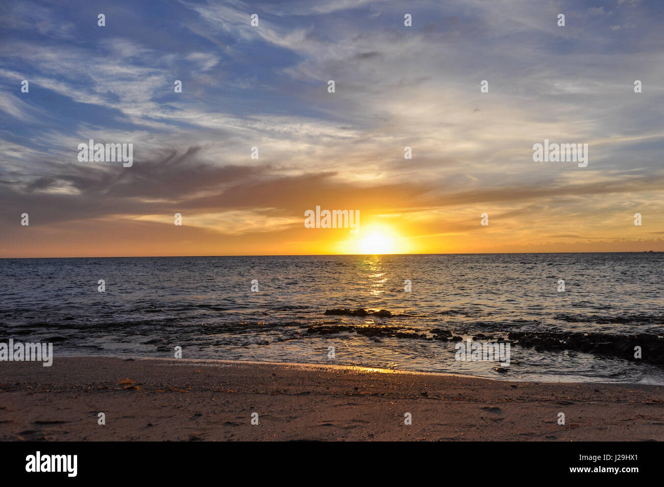 Tropical beach sunset view hi-res stock photography and images - Alamy