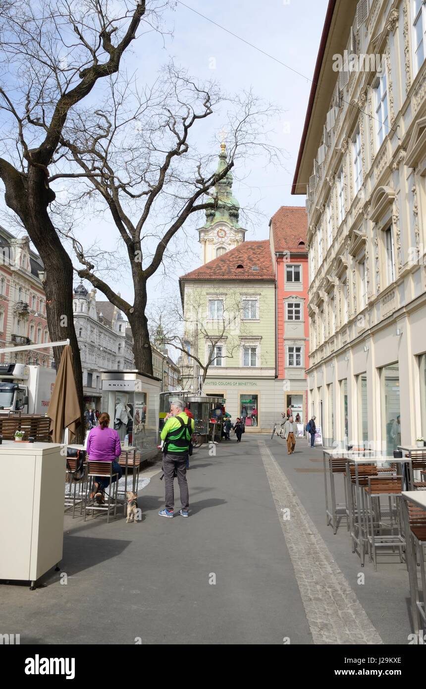 People at the plaza of Iron Gate, next to the main street of of Graz ...
