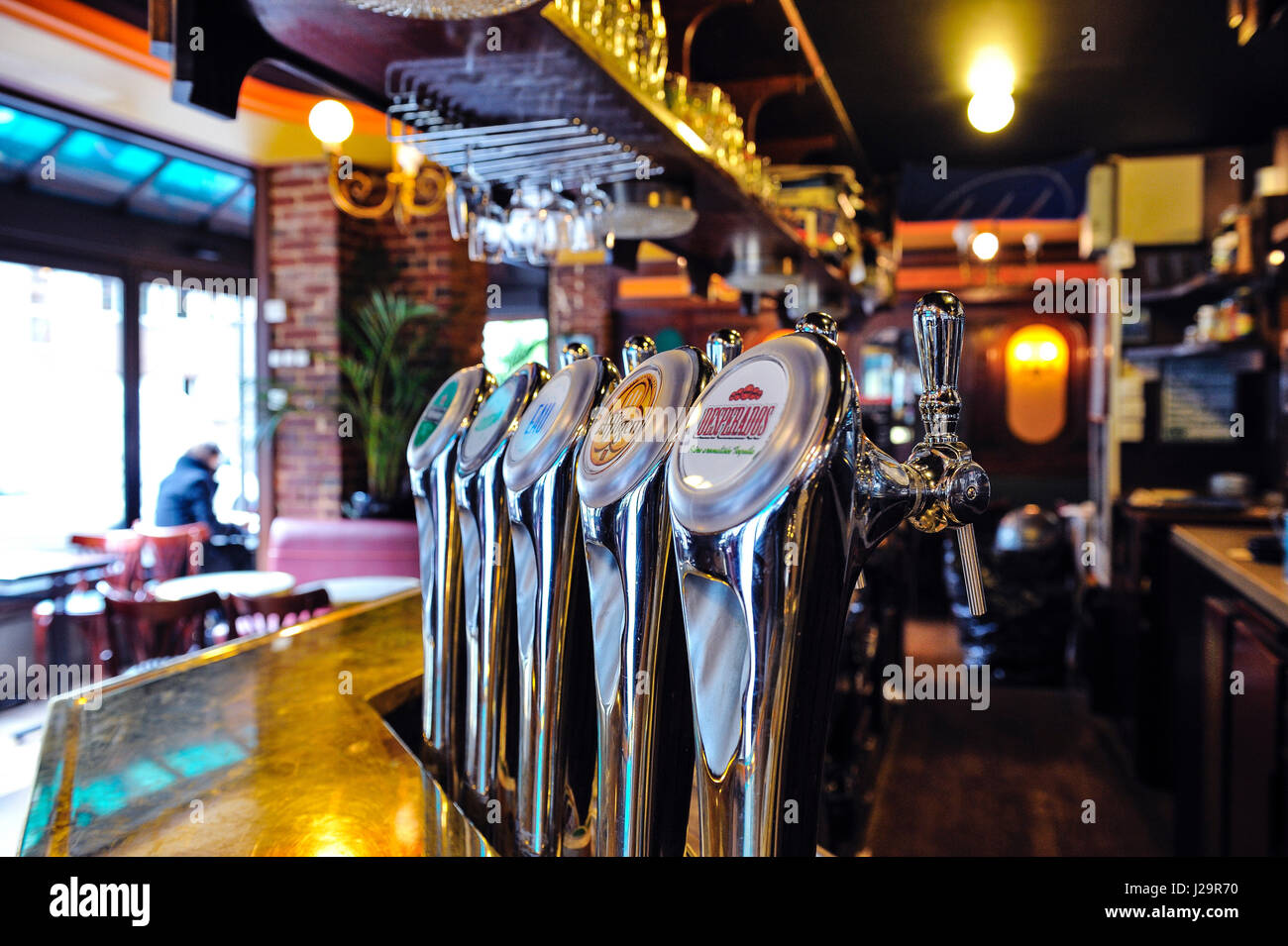 France, Paris, Parisian pub with its counter and beer pumps Stock Photo ...
