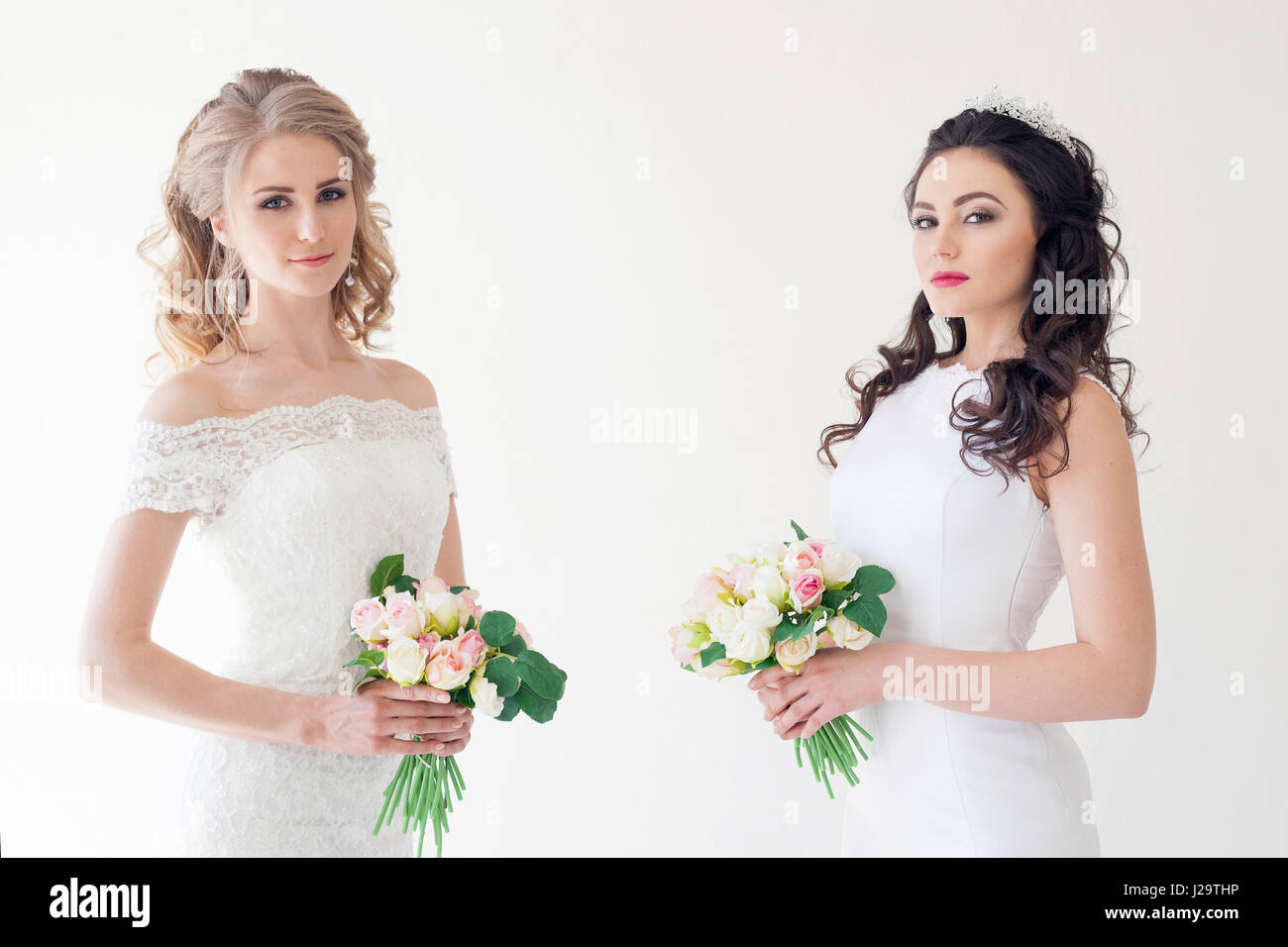 two wedding bride with bouquet wedding Stock Photo - Alamy