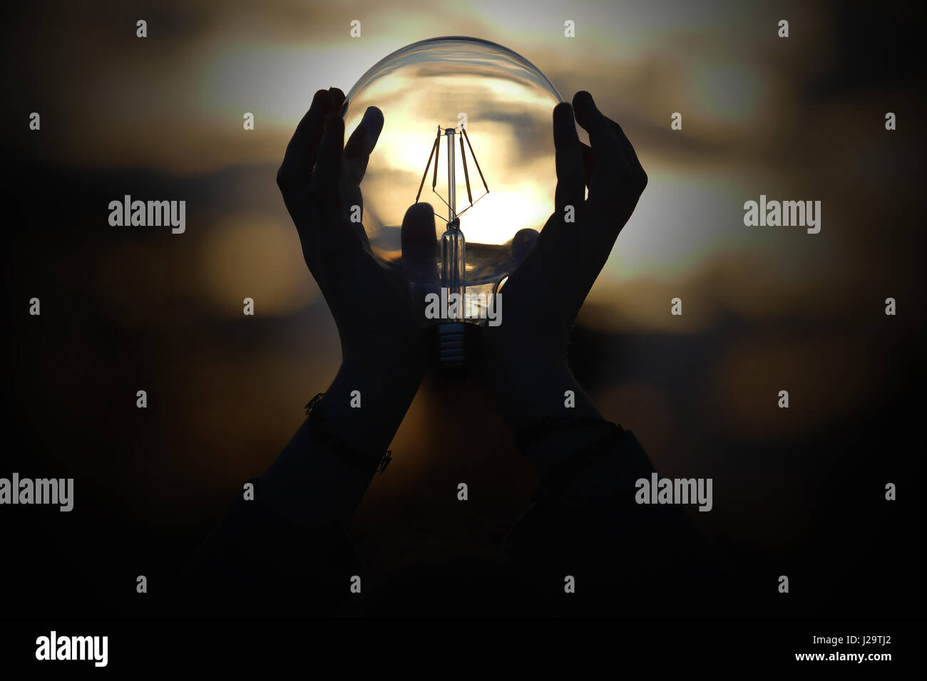 sunshine light bulb Stock Photo - Alamy