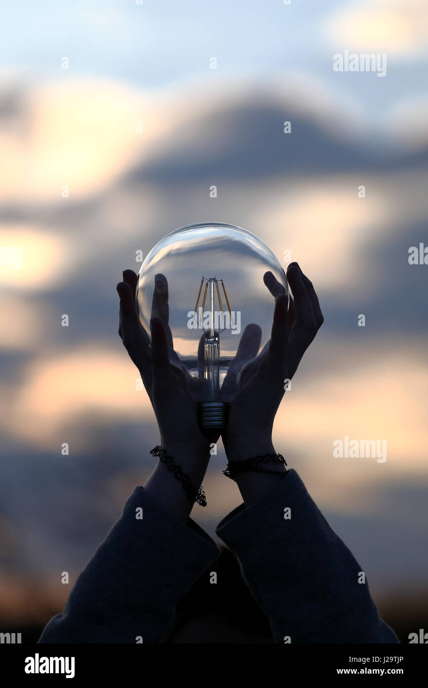 sunshine light bulb Stock Photo - Alamy