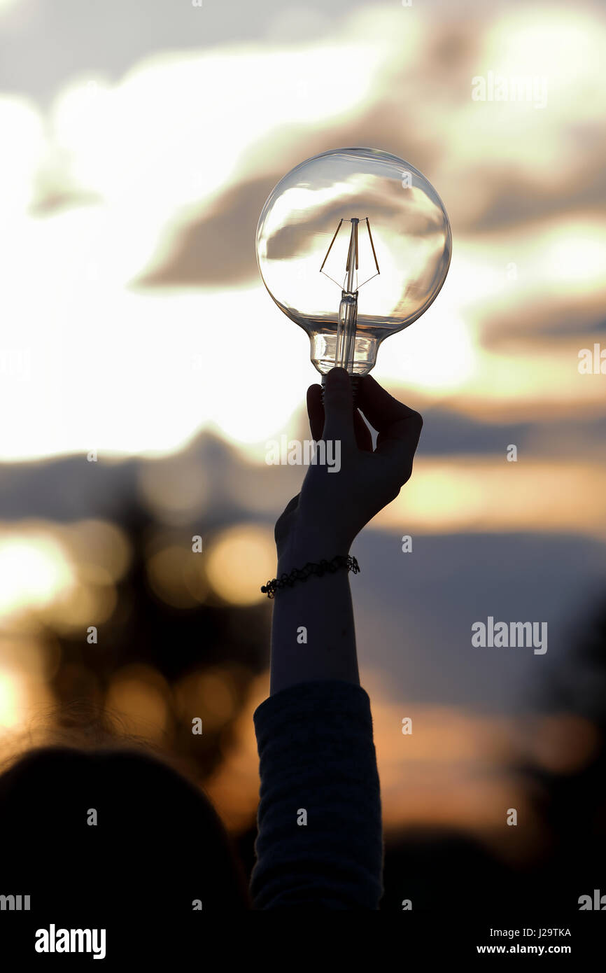 sunshine light bulb Stock Photo - Alamy