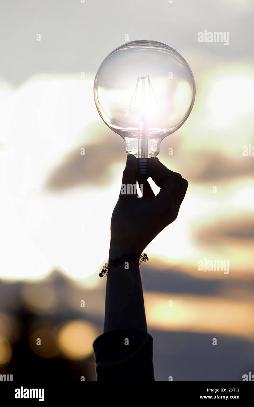 sunshine light bulb Stock Photo - Alamy