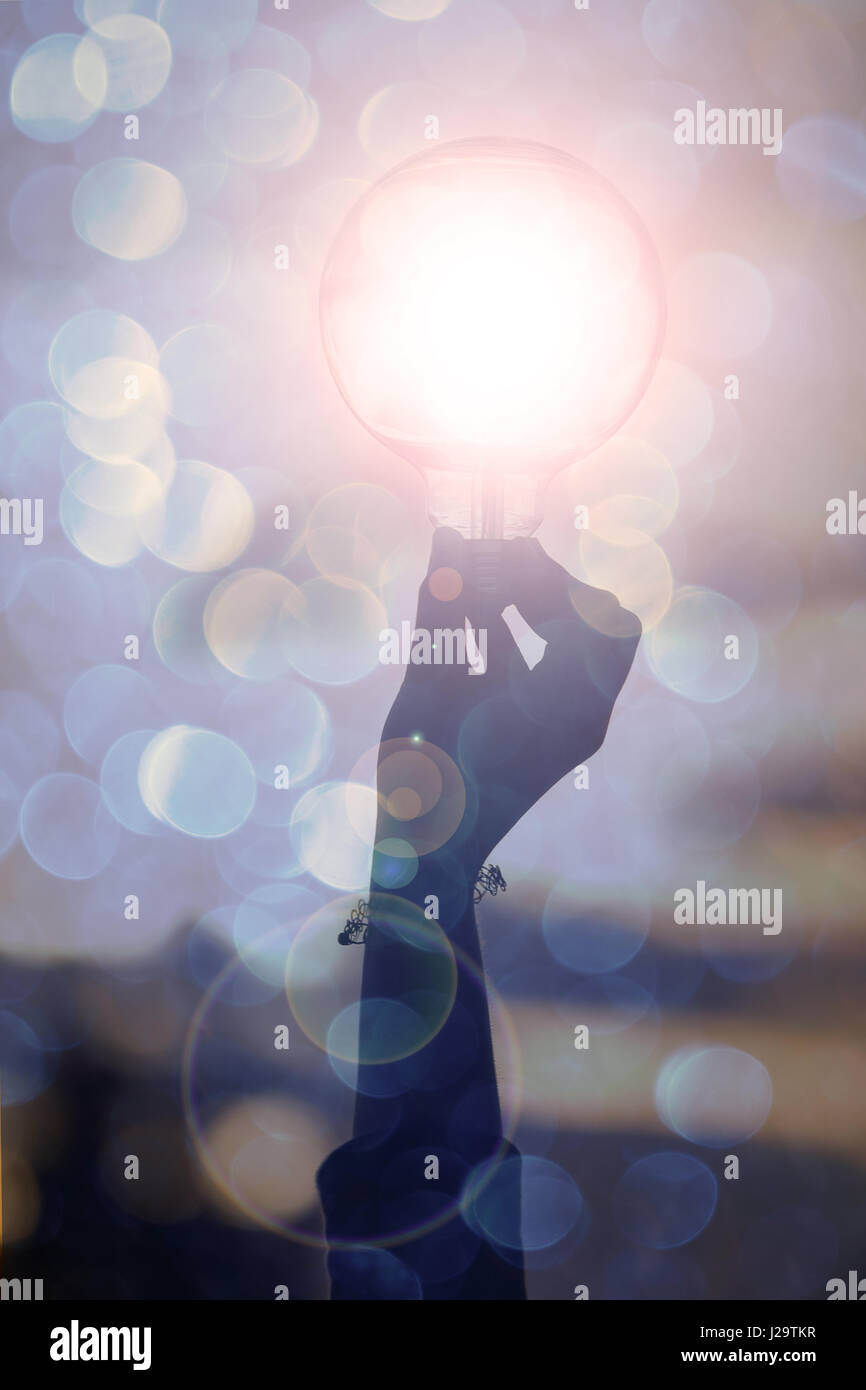 Lightbulb on finger hi-res stock photography and images - Alamy