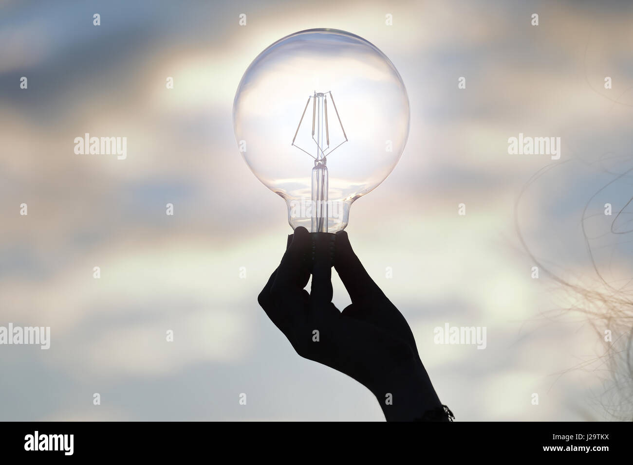 sunshine light bulb Stock Photo - Alamy