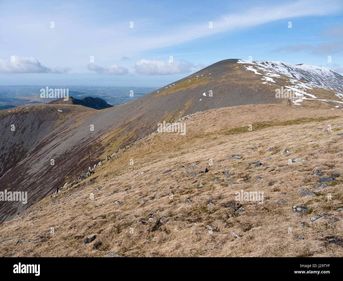 The summit of Skiddaw, a mountain in the English Lake District, viewed ...