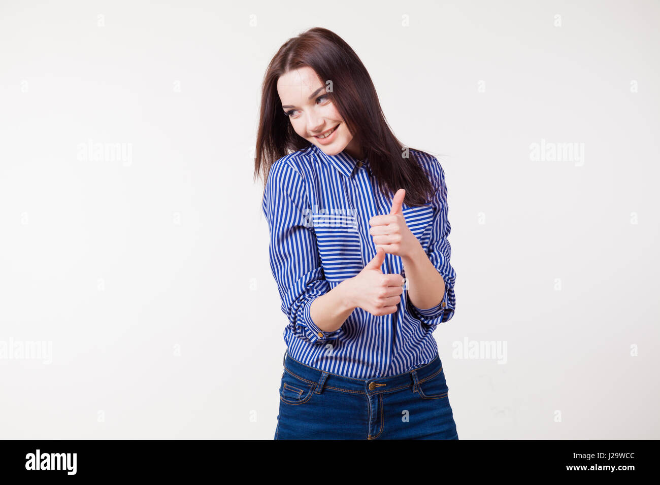 nice girl shows up good finger Stock Photo - Alamy
