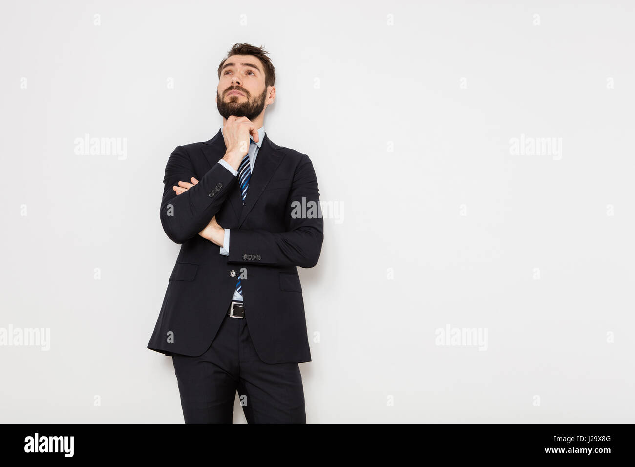 Confident man in suit hi-res stock photography and images - Alamy