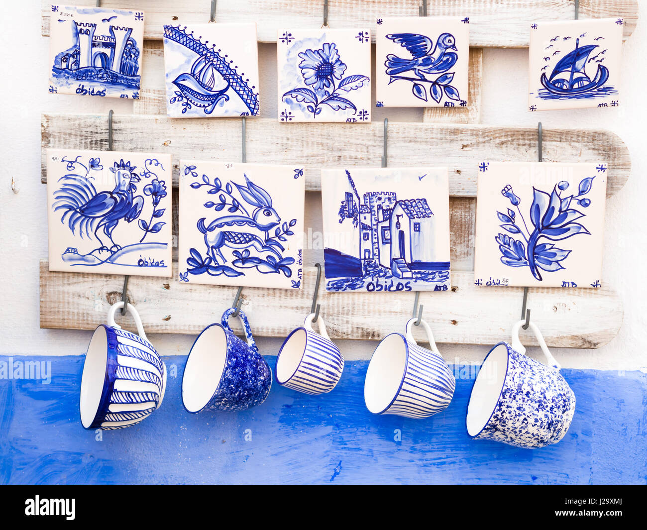 Traditional Portuguese pottery sold as souvenirs in Obidos Stock Photo ...
