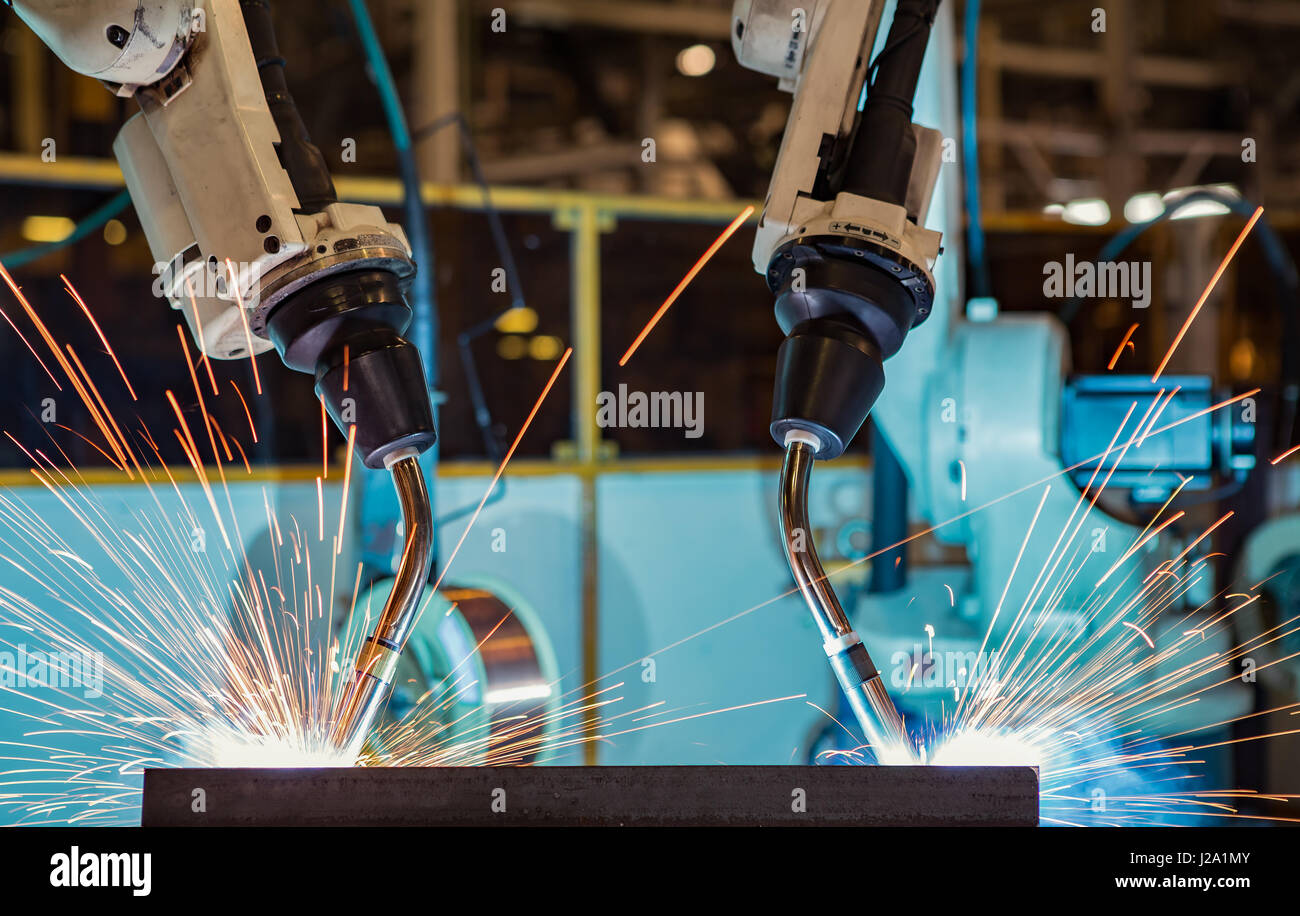 Factory robots close hi-res stock photography and images - Alamy